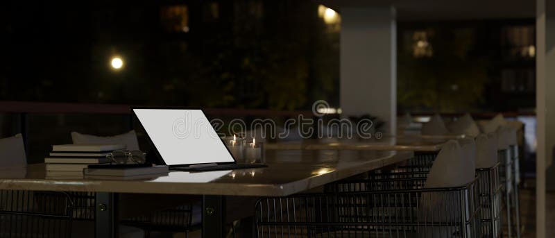 Close-up Image of a Laptop Mockup on a Dining Table in a Luxury ...