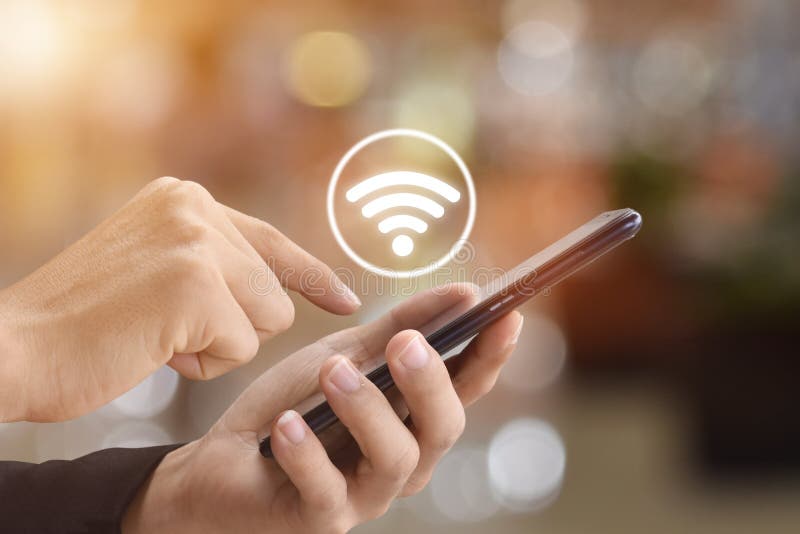 Close-up Image of Male Hands Using Mobile Smartphone with Wifi Icon ...
