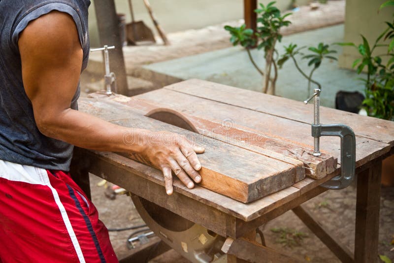 Man working on a saw. stock image. Image of machine, plank - 29750075
