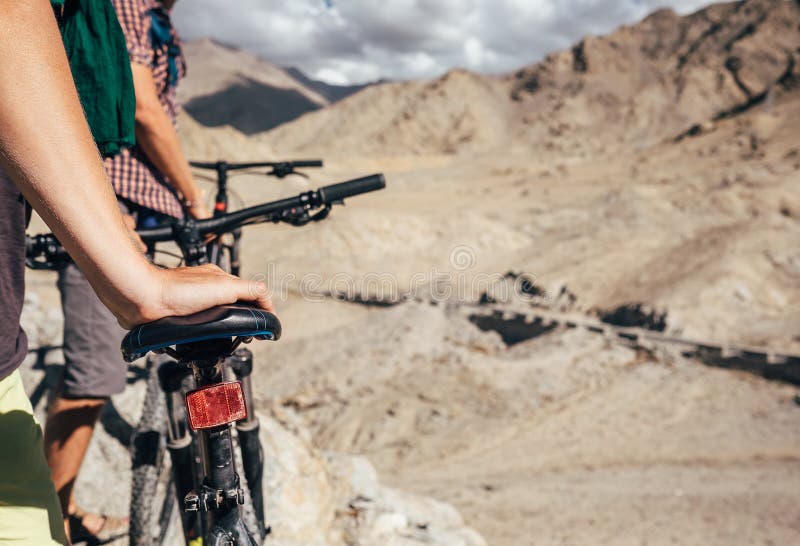 Close Up Image Man Hand on Bicycle Saddle. Two Maountain Bikers Stock ...