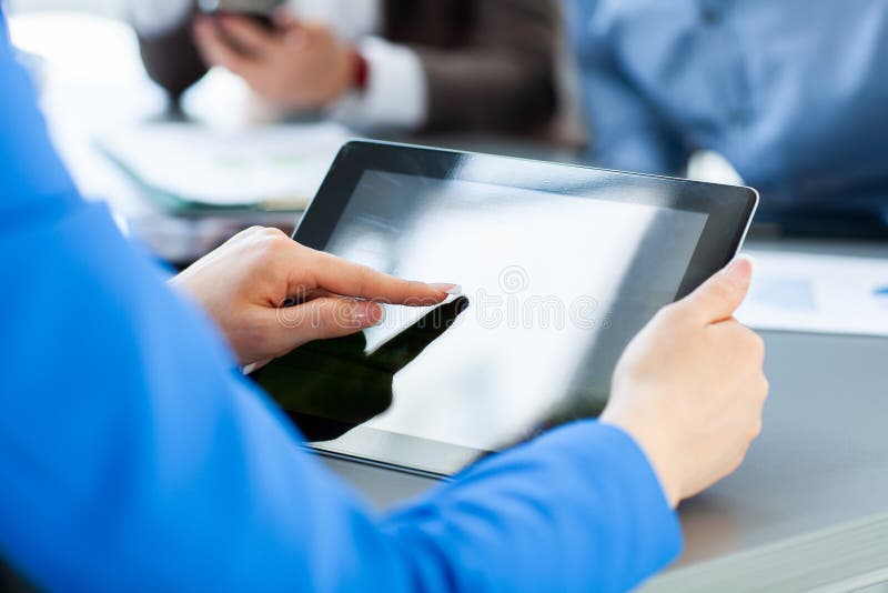 Close-up Image of an Office Worker Using a Tablet To Analyze ...