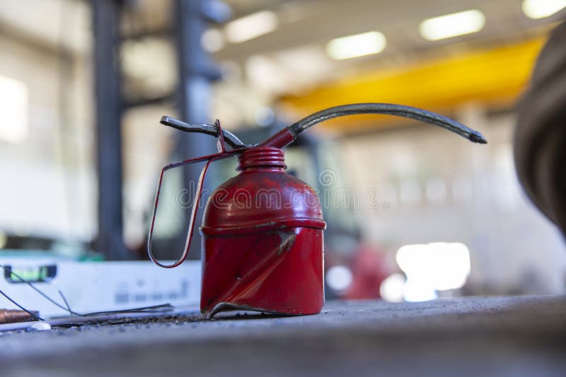 Close-up Image of Old Red Color Metal Oiler in Indoor Workshop Stock ...