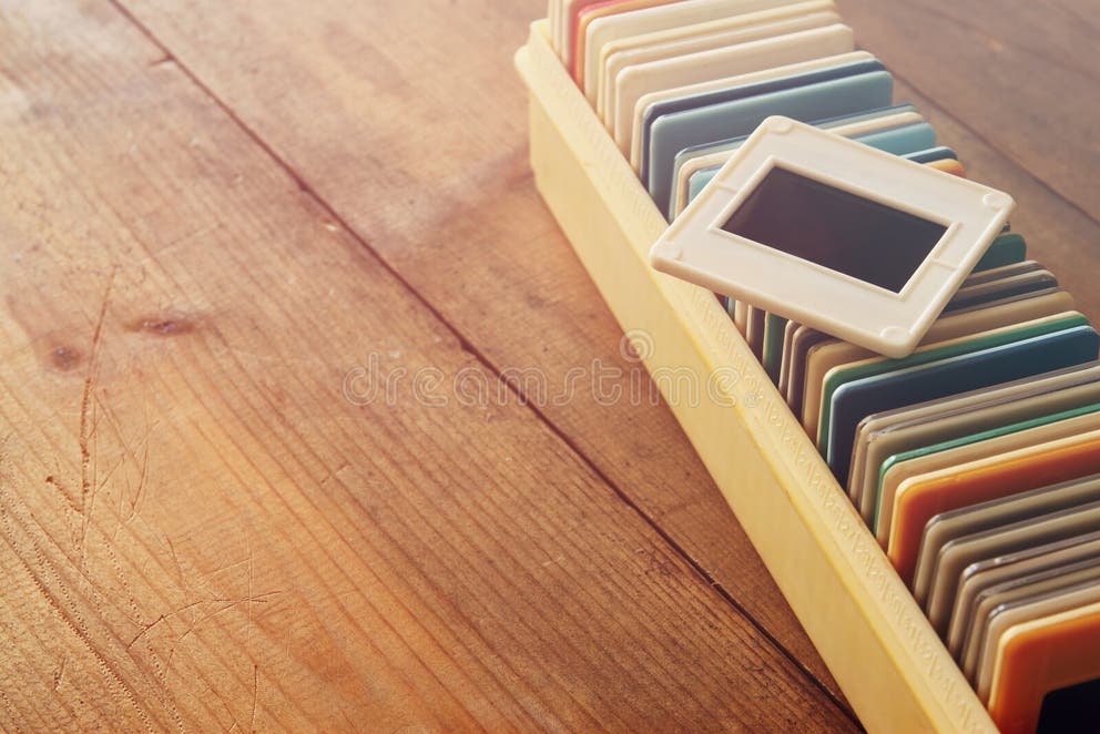 Close Up Image of Old Slides Frames and Old Camera Over Wooden Table ...