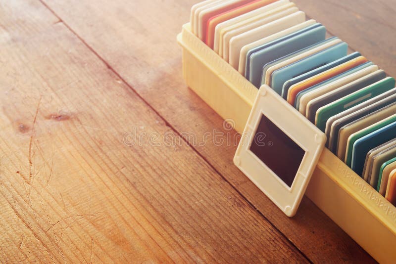 Close Up Image of Old Slides Frames and Old Camera Over Wooden Table ...