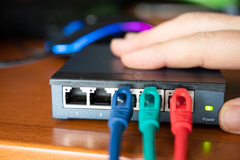 Close-up Image of a Router: the Connections of the Three Red, Green and ...