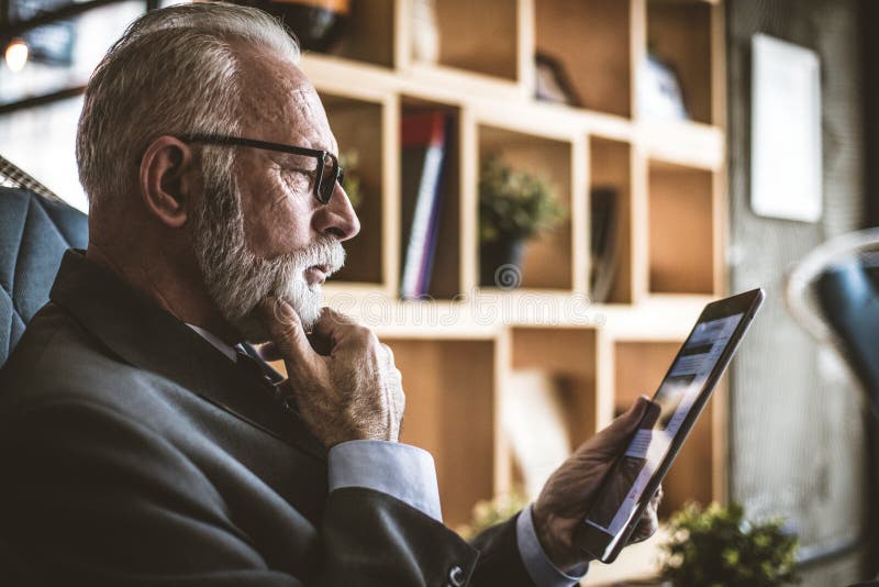 Close Up Image of Senior Man Working on Digital Tab. Stock Image ...