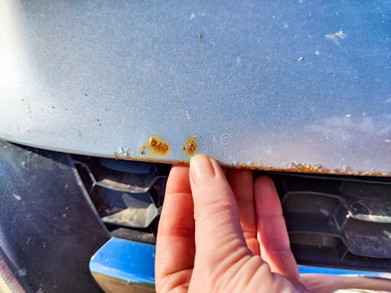 A Close Up Image Showing Rust Damage Along the Edge of a Car Hood Stock ...