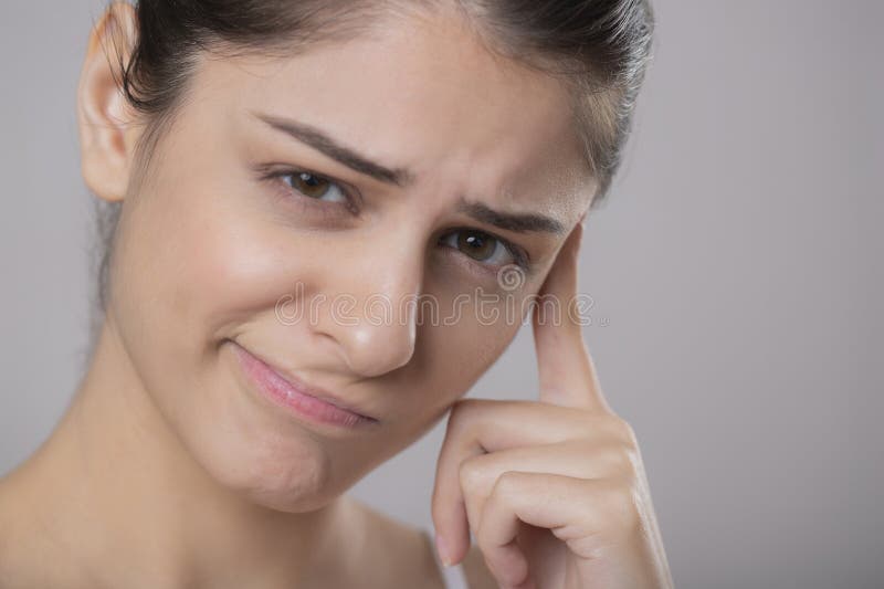 Close Up Image Shows a Shy Lady Getting Confused and Looking at the ...