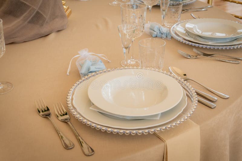 Empty Wedding Reception Hall Table Setting with Silver Charger Plates ...