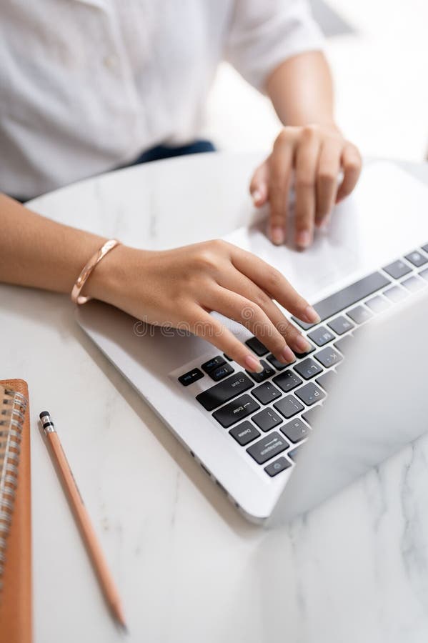 A Close-up Image of a Woman Typing on Keyboard, Working on the Computer ...