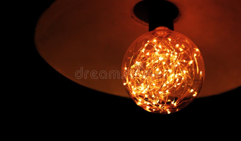 Close Up Incandescent Lamp Shining, Orange Light of Lamp Hang on ...