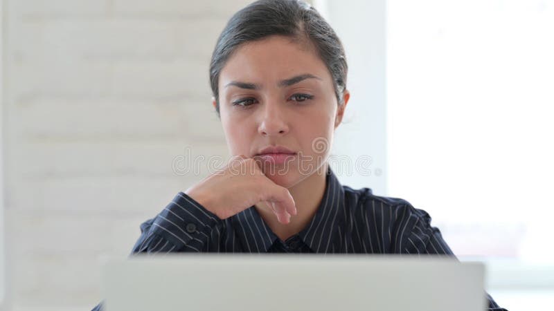 Close Up of Indian Woman Thinking and Working on Laptop Stock Image ...