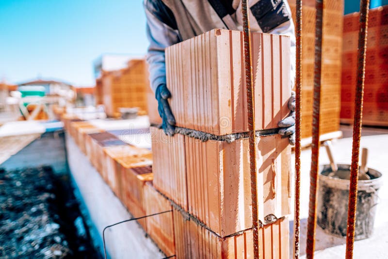 Close-up of Construction Worker, Bricklayer Building New House with ...