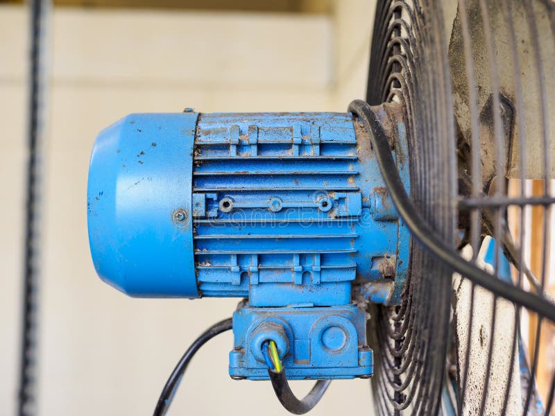 Close-up of a Industrial Electric Motor with Blue Casing, Mounted on a ...