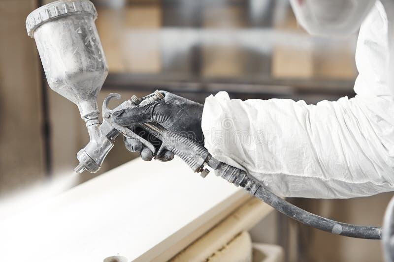 Close-up of Industrial Worker Using Paint Gun or Spray Gun for Applying ...