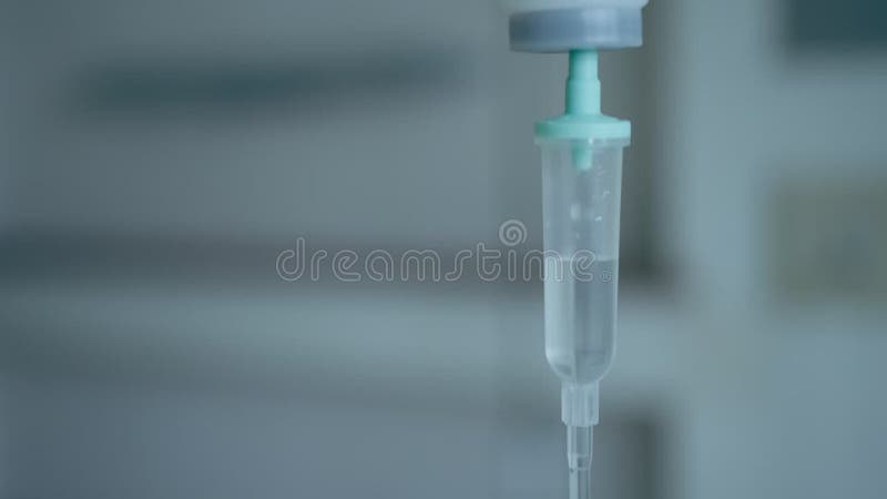 Close-up of the Infusion Process. Drop of Saline is Dripped for ...