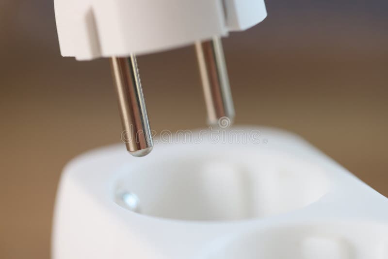 Close-up of Inserting Electric Plug into Socket. Stock Image - Image of ...