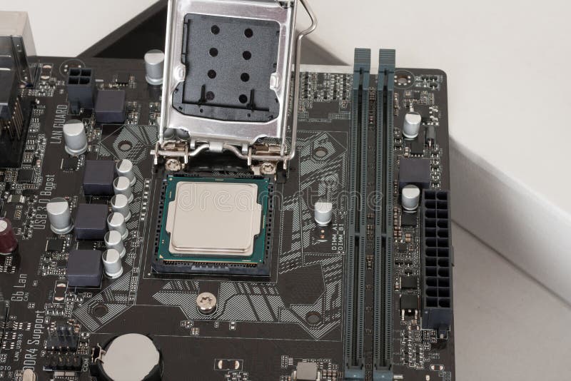 Close Up of Installed CPU Processor on Modern, New, Motherboard Stock ...