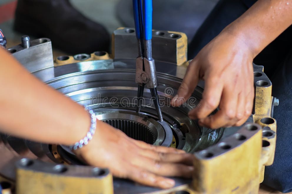 Close Up Installing Ring Retaining Bearing Using Snap Ring Pliers ...