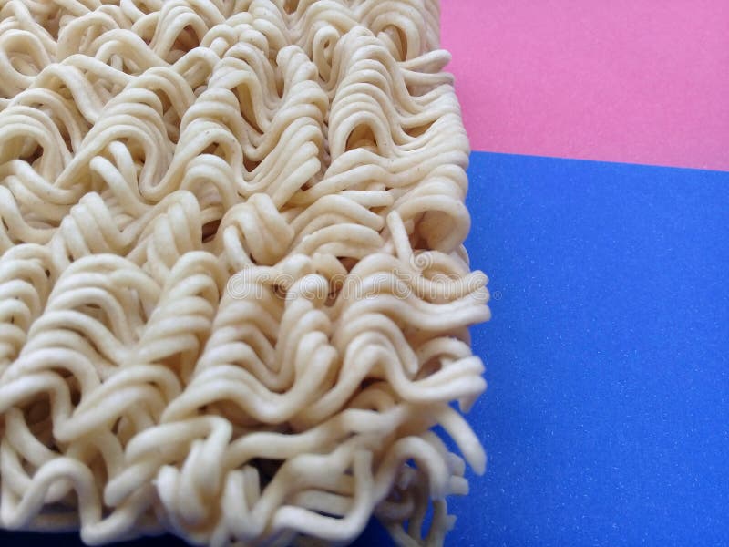 Close-up of Instant Noodles with Blue and Pink Background Stock Photo ...