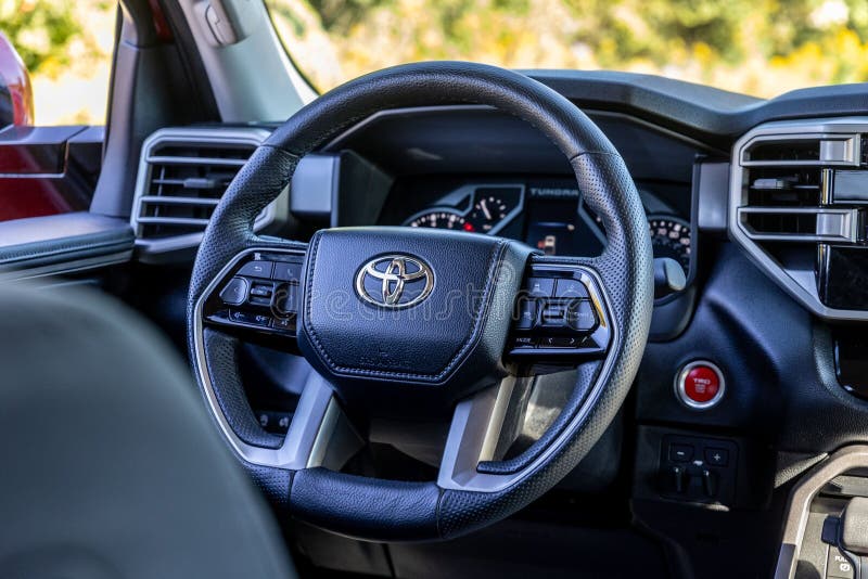 Close Up of the Interior of a Car Dashboard Featuring the Steering ...
