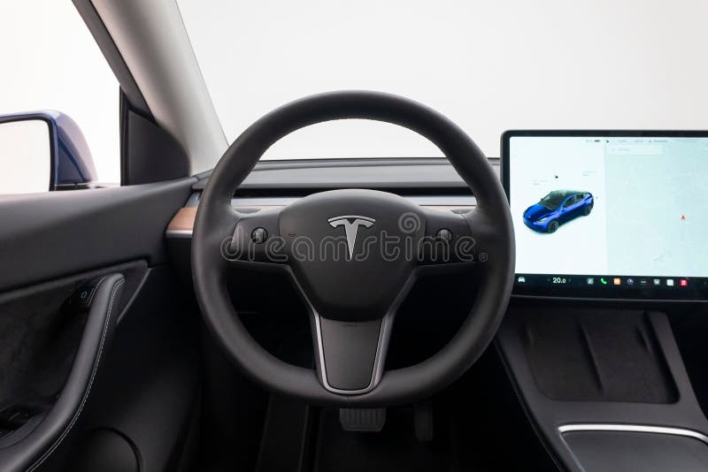 Close-up of an Interior Tesla Dashboard with a Sleek, Modern Black and ...