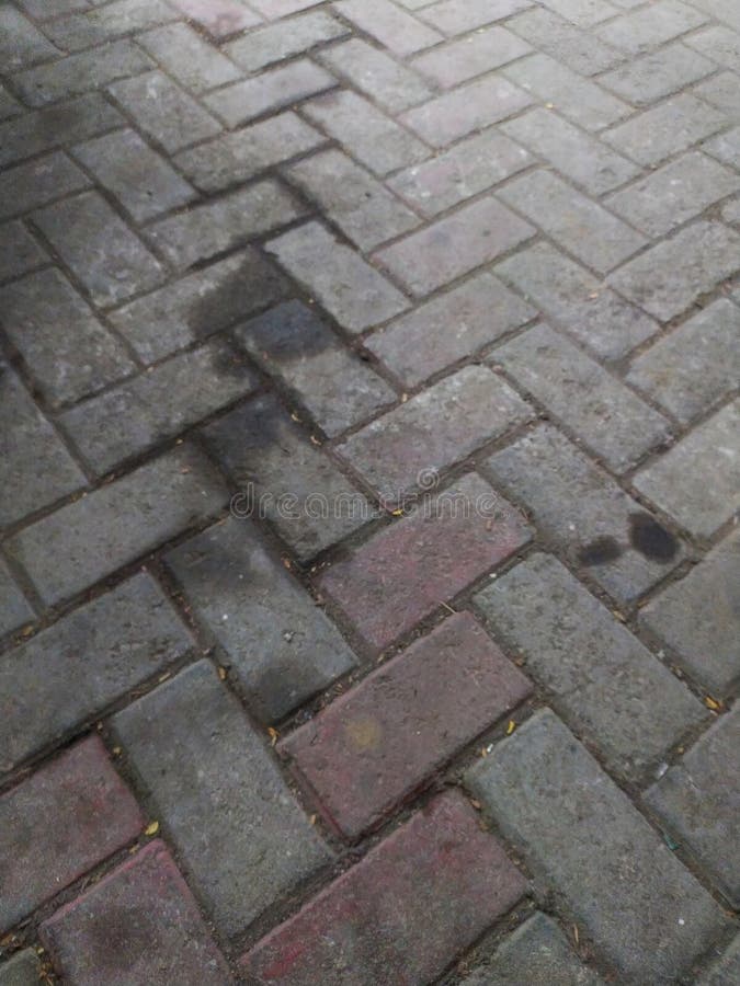 Close-Up of Interlocking Concrete Pavement Blocks with Stains Stock ...
