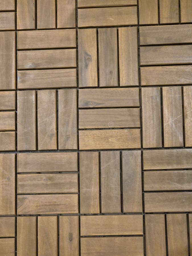 A Close-up of Interlocking Wooden Deck Tiles, Showcasing Their ...
