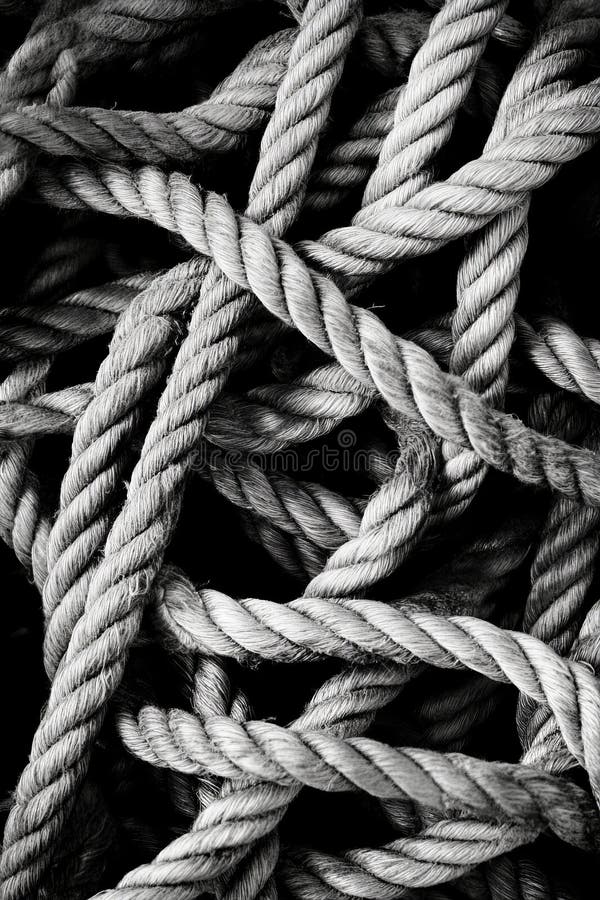Close-Up of Intertwined Nautical Ropes in Black and White Highlighting ...