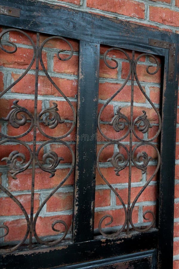 Macro Close-up of Iron Insert with Scroll Design on Reclaimed Painted ...