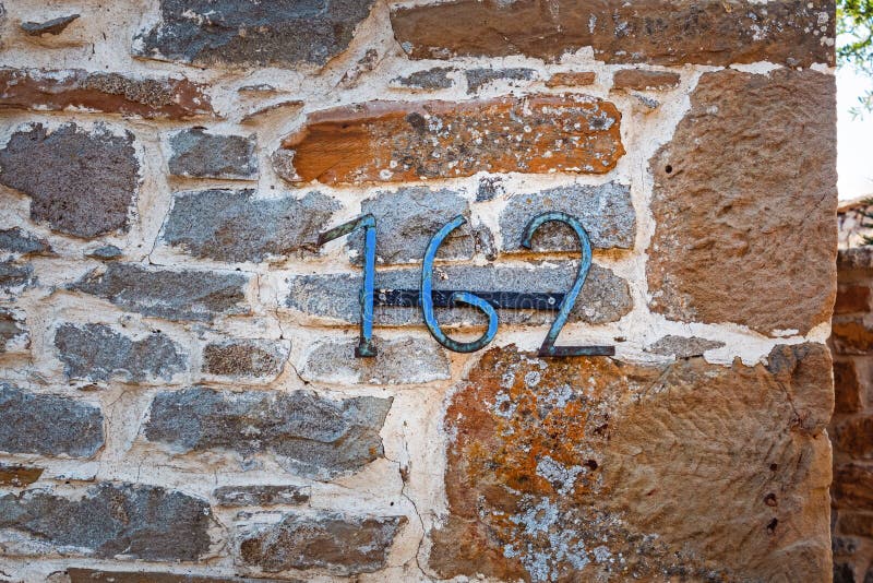 162 Numbers on Stone Wall. stock image. Image of wall - 127984523