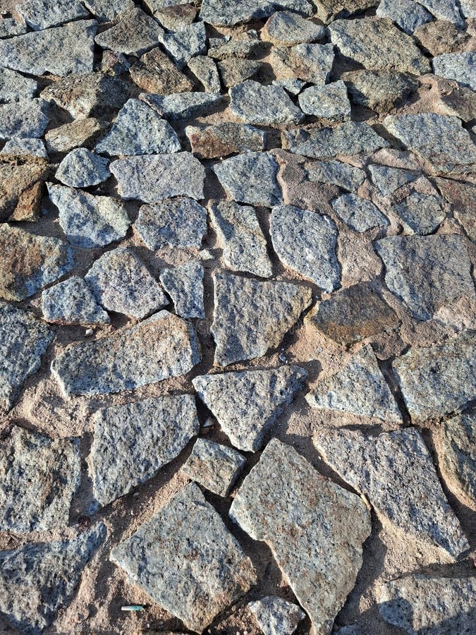 Close-up of Irregular Natural Stone Pavement in Warm Sunlight. Stock ...