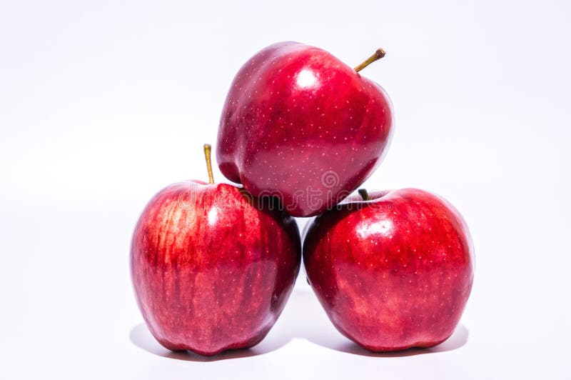 Three fresh red apples stock image. Image of background - 153759607