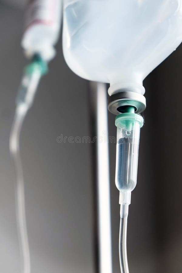 Close Up of IV Saline Solution Drip Stock Image - Image of room ...
