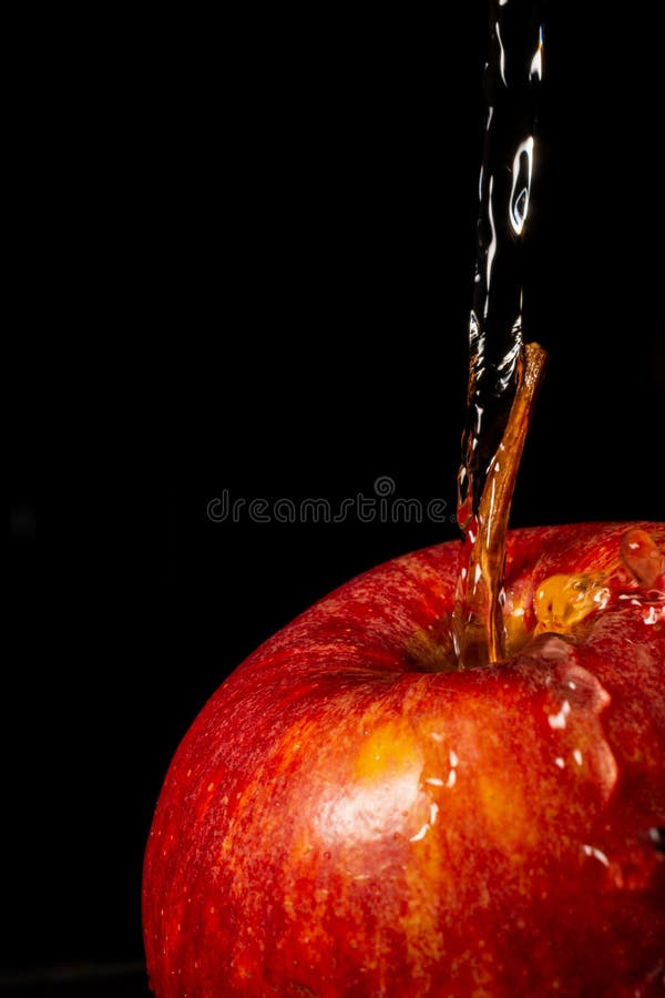 Close-up of Jet of Water Falling on Red Apple, Selective Focus ...