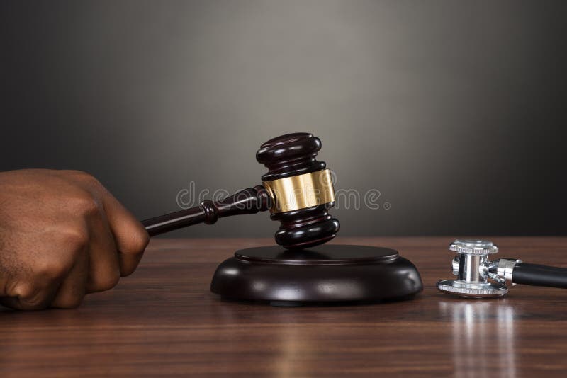 Close-up of a Judge Hands Striking Gavel at Desk Stock Image - Image of ...