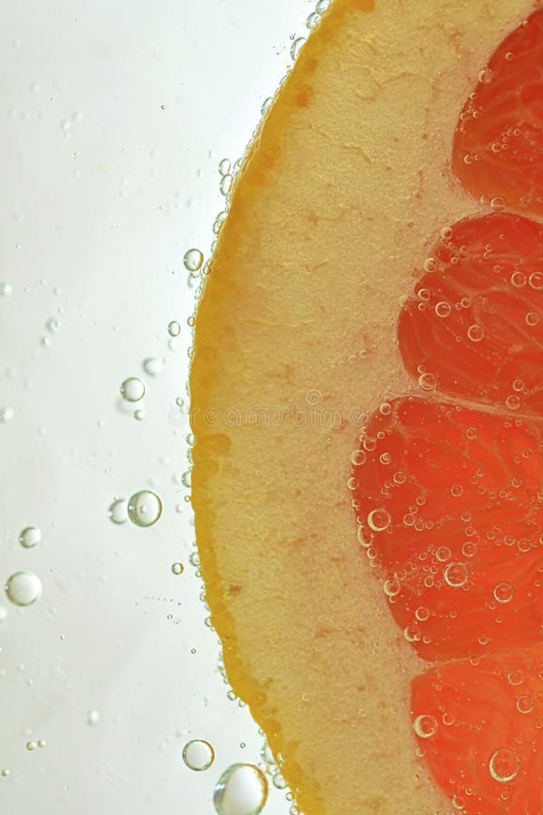 Close-up of Juicy Grapefruit Slice on White Background. Slice of Red ...