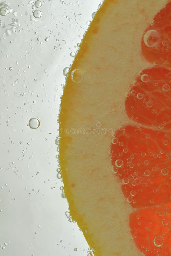 Close-up of Juicy Grapefruit Slice on White Background. Slice of Red ...