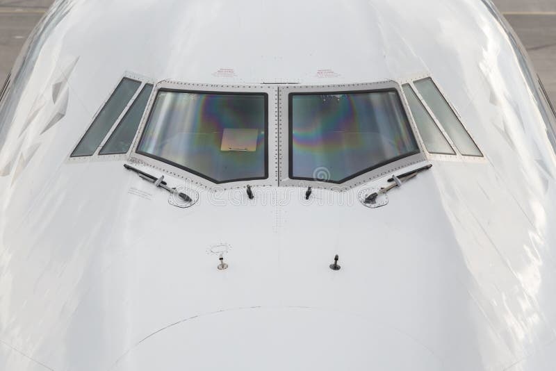 Close Up of a Jumbo Jet Nose, Front View with Windshield and Wipers ...