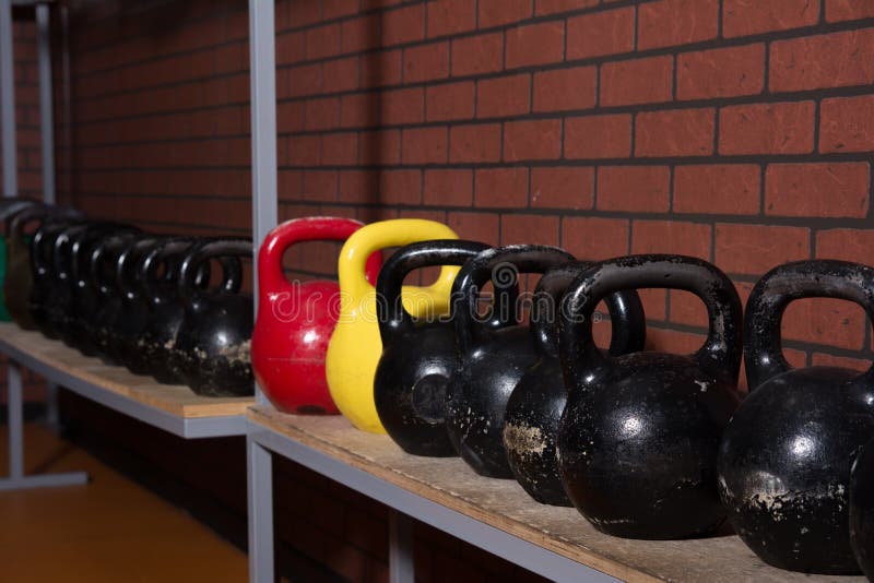 Close Up Kettlebells in the Gym on a Brick Stock Image - Image of ...
