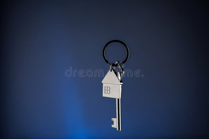 A Close Up of a Key on Blue Background Stock Photo - Image of large ...