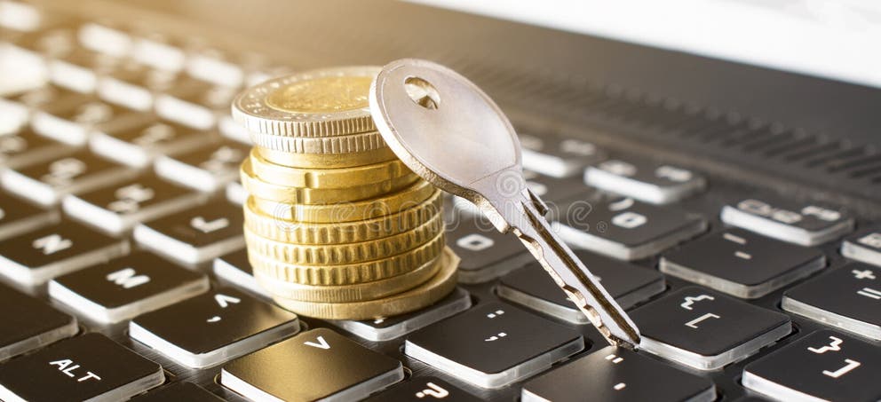 Close-up of Key and Stack of Coins on Black Keyboard. Insurance Concept ...