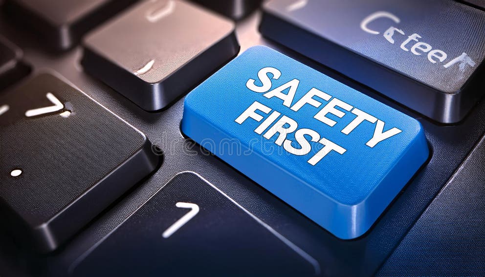 A Close-up of a Keyboard with a Blue Key Labeled Safety First in White ...