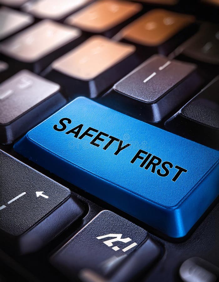A Close-up of a Keyboard with a Blue Key Labeled Safety First in White ...