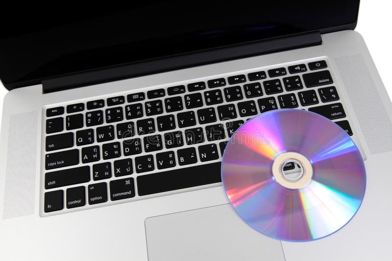 Close Up Keyboard Computer with Cd on White. Editorial Stock Image ...