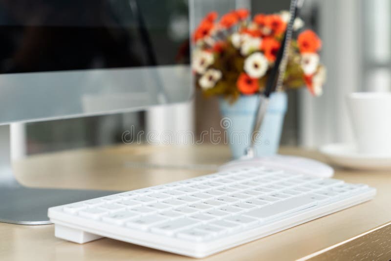 Close Up Keyboard Desktop PC Computer on Table in Small Modern Office ...