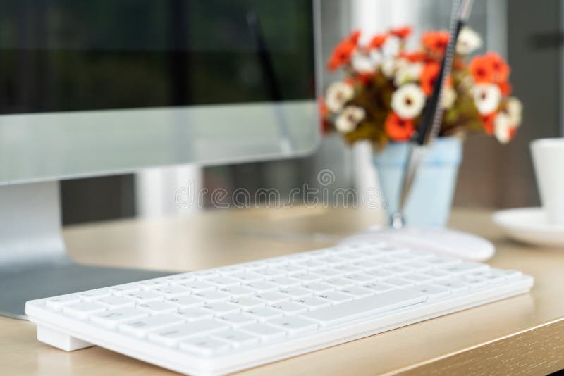 Close Up Keyboard Desktop PC Computer on Table in Small Modern Office ...