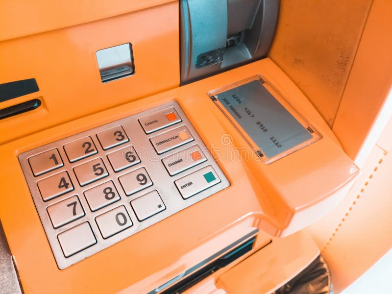 Close Up of a Keypad Installed in a Yellow ATM Machine with Button Say ...