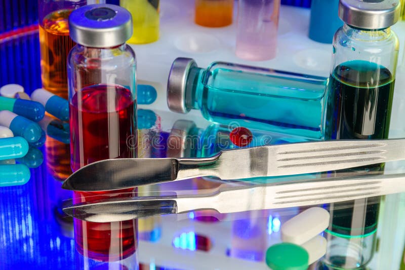 Close Up Lab Bottles with Colored Solution. Stock Photo - Image of ...