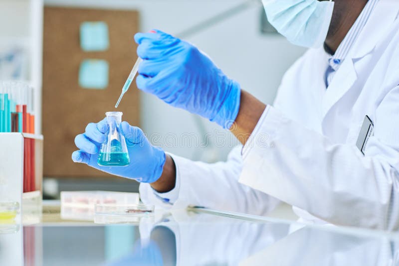 Lab Technician Taking Liquid Samples with Pipette Doing Research Stock ...